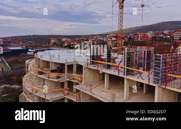 An aerial view showcases a construction site where a new building is ...
