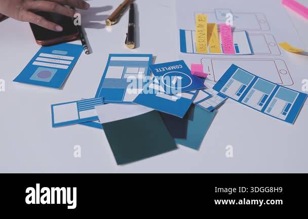 team of UI UX web designer are working together to develop mobile ...