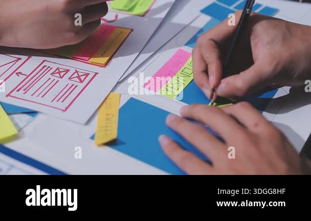 team of UI UX web designer are working together to develop mobile ...