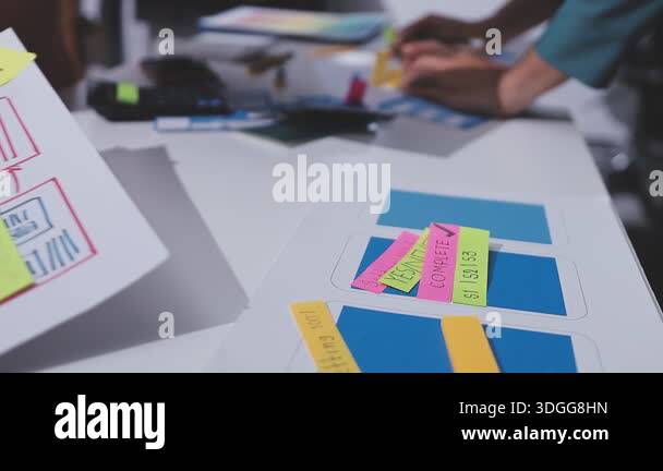 team of UI UX web designer are working together to develop mobile ...