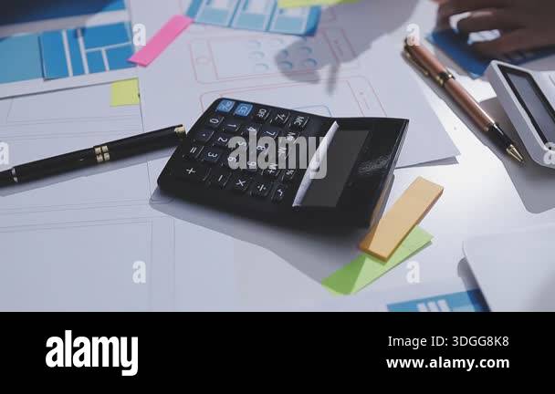 team of UI UX web designer are working together to develop mobile ...