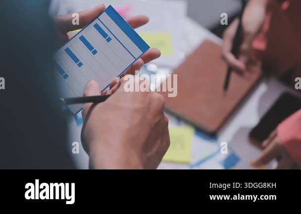 team of UI UX web designer are working together to develop mobile ...