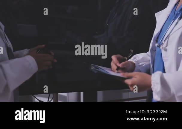 Medical staff team african american meeting discussing chest x-ray film ...