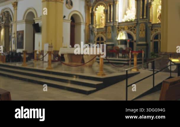 Blurred church interior with soft bokeh focus showing altar, steps and ...