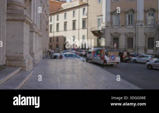Blurred street scene in rome with shallow bokeh and softly defocused ...