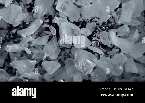 Super Slow Motion Shot of Real Ice Exploding Towards Camera on Black ...