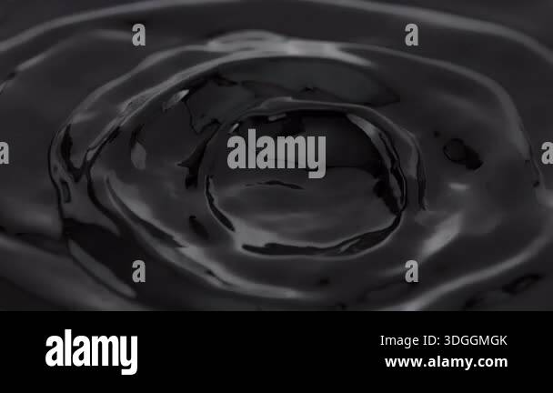 Super Slow Motion Shot of a Swirling Dark Liquid in a Circular Shape at ...