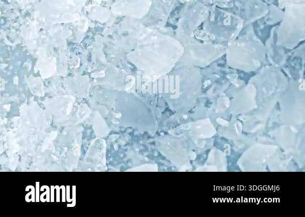 Super Slow Motion Shot of Real Ice Cuts Exploding Towards Camera on ...