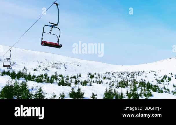 Ski lift ropeway on highland alpine mountain winter resort.Ski ...