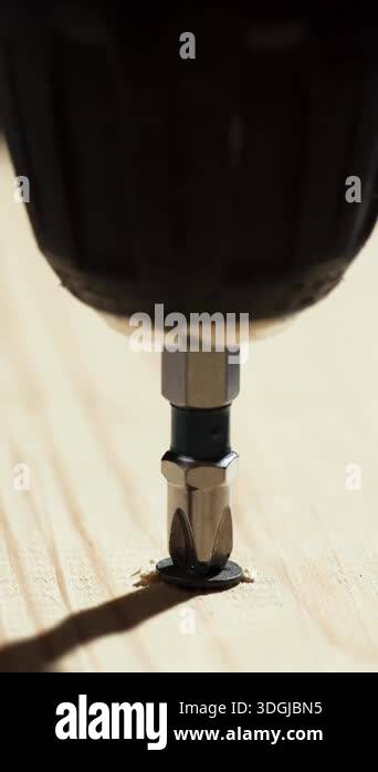 Macro DOF of cordless screwdriver with bit for unscrewing screws on ...
