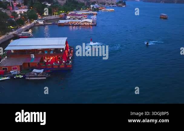 Flyboard action under orange sky reflections Stock Video Footage - Alamy