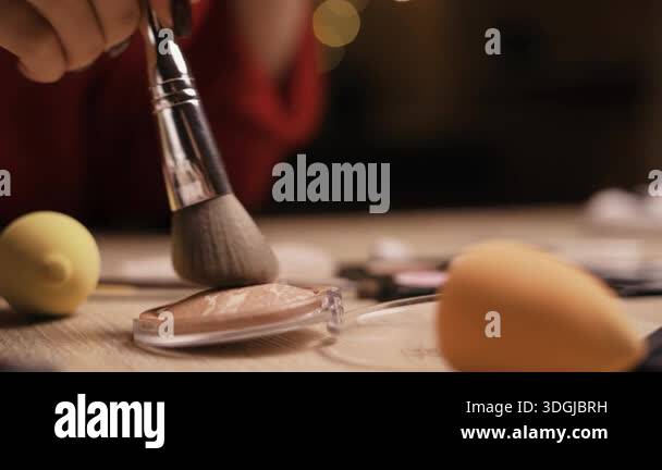 Brush puts in brown-beige bronzer for make-up. Cosmetic, powder ...