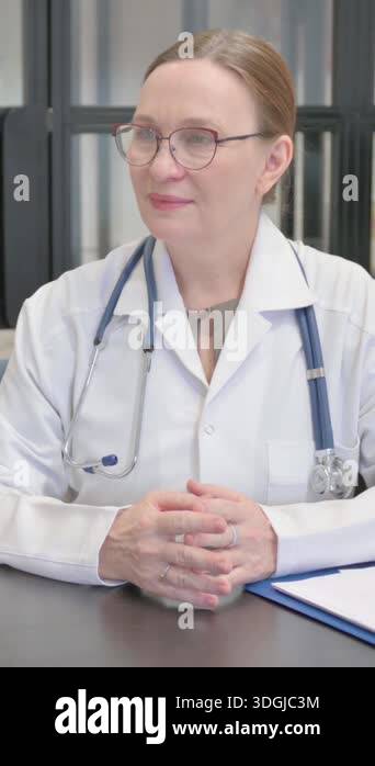 Old Lady Doctor Talking with Patient, vertical video Stock Video ...