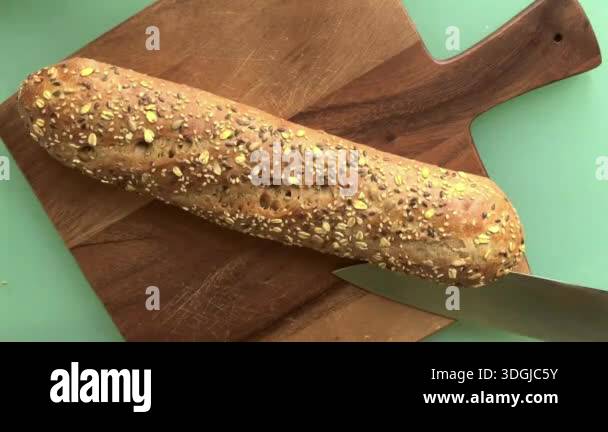 Freshly baked bread stick with toppings Stock Video Footage - Alamy