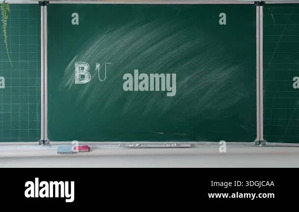 BULLYING is written in chalk on a green chalkboard. Social problems of ...
