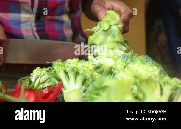 Close up of person chopping broccoli for healthy meal Stock Video ...