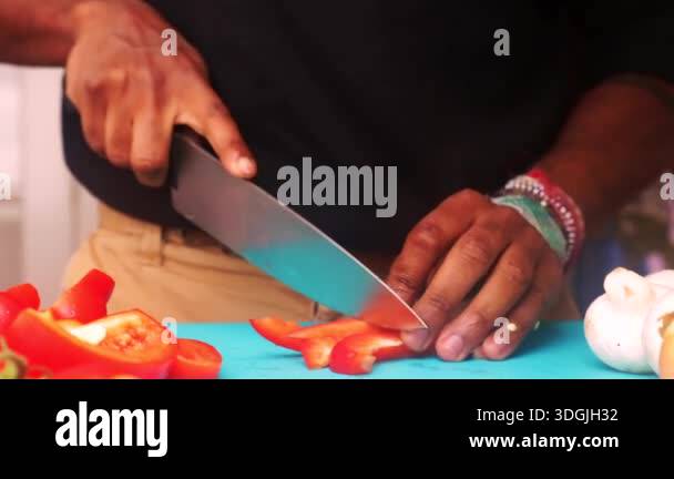 Person hands preparing Bell red Pepper on cutting board Stock Video ...