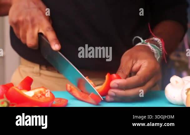 Person hands preparing Bell red Pepper on cutting board Stock Video ...