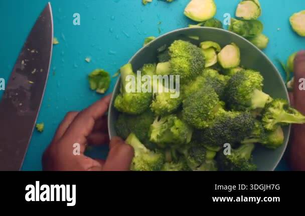 Person preparing organic vegetables in kitchen Stock Video Footage - Alamy