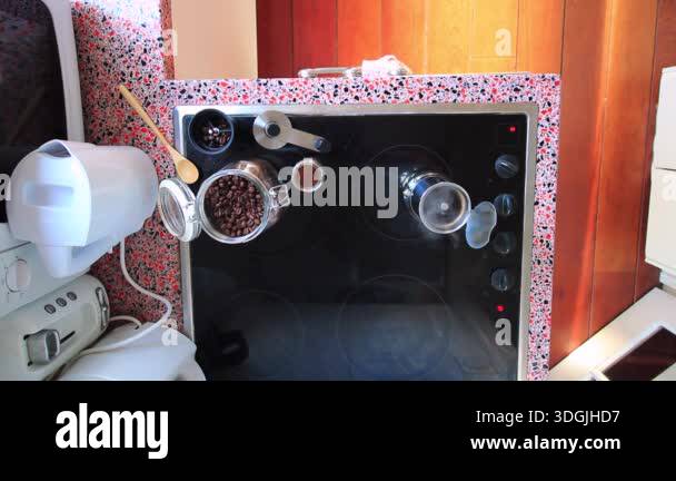 espresso coffee being prepared with moka pot on electric stove Stock ...