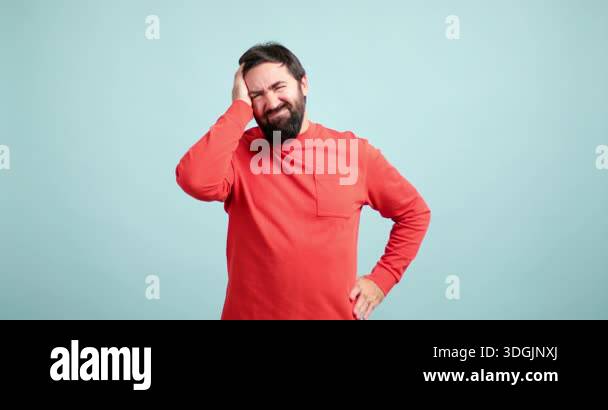 Anxious man suffering from stress, anxiety, and desperation against a ...