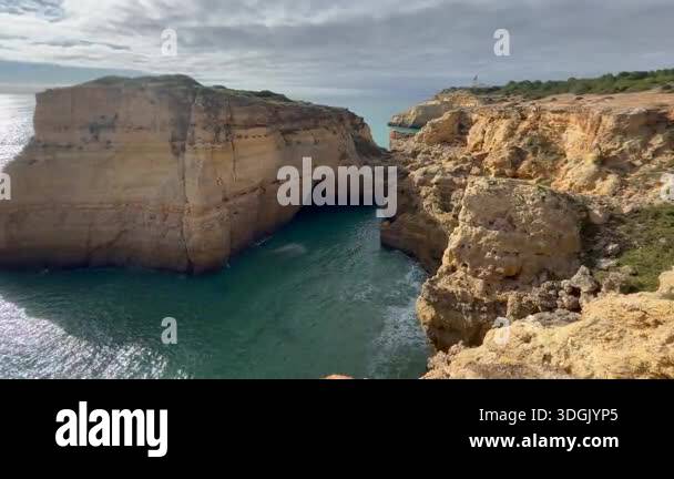 Top down view of the Algarve coast including the Farol de Alfanzina ...