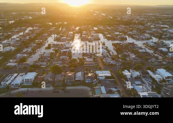 Drone captures Gold Coast's Nerang River at sunset, showcasing vibrant ...
