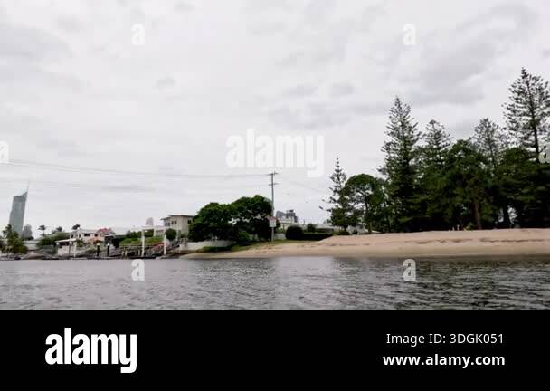 River, trees, and cityscape in Gold Coast Stock Video Footage - Alamy