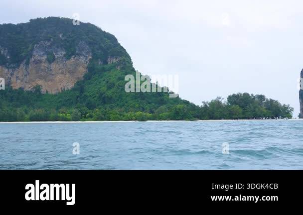Lush island landscape viewed from ocean near Railay Beach, Krabi Stock ...