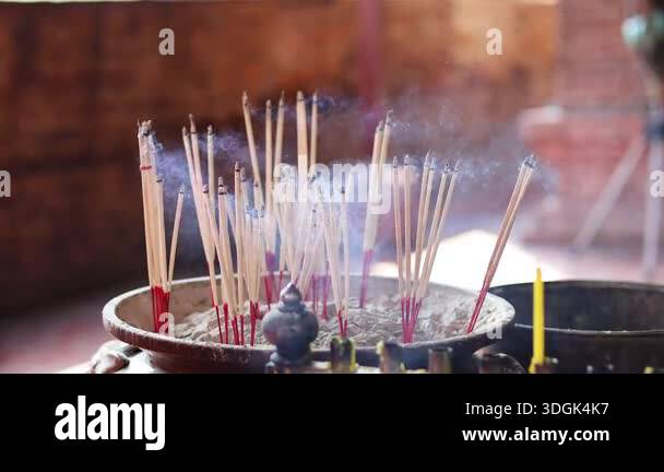 Time-lapse of incense sticks burning and smoking Stock Video Footage ...