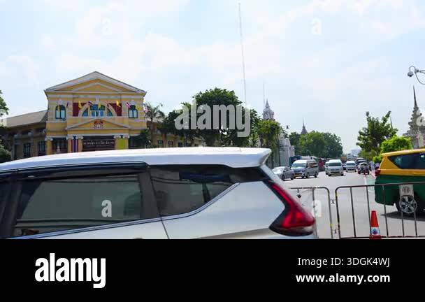 Daytime traffic flows past the Territorial Defense Command in Bangkok ...