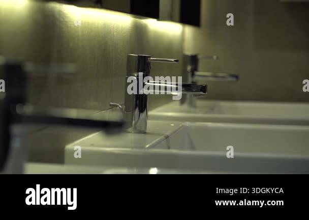 Modern Public Bathroom Sink with Chrome Faucet in Premium Sports Club ...