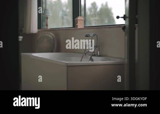 Elegant Bathroom Interior with Freestanding Bathtub, Classic Sink and ...