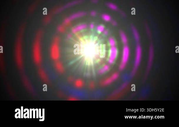 Colorful light glare rings motion graphics with plain black background ...
