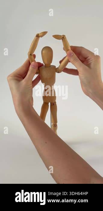 Wooden mannequin takes first steps, moving like a poseable figure. This ...