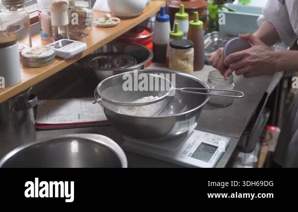 A woman making sweets Stock Video Footage - Alamy