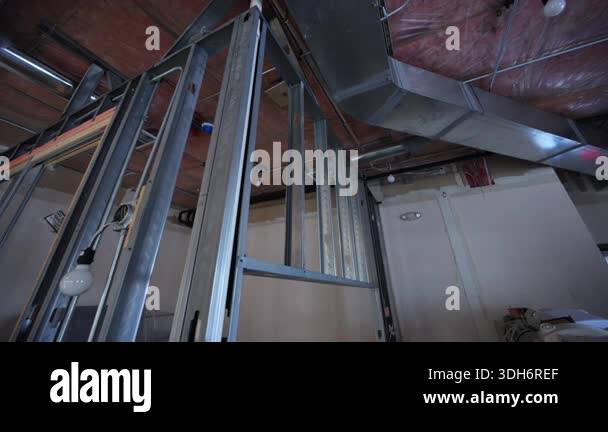 POV of HVAC system under the installation with exposed airducts ...