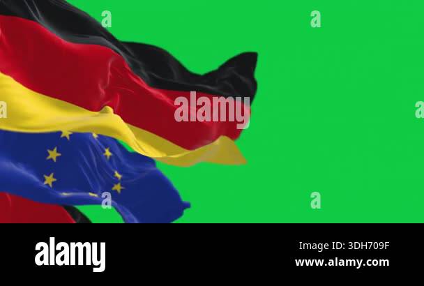Flags of Germany and the European Union waving in the wind isolated on ...
