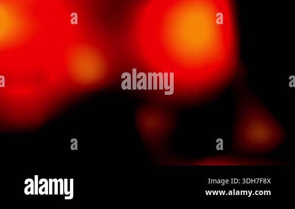 Orange red light leak abstract animation on black background. Glowing ...