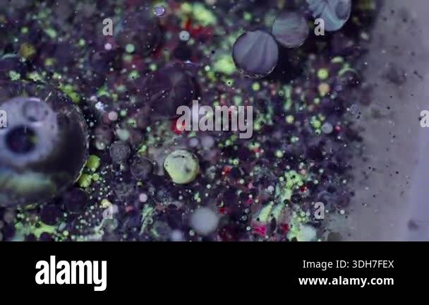 Mix texture. Paint water. Defocused yellow blue colorful oil dark black ...