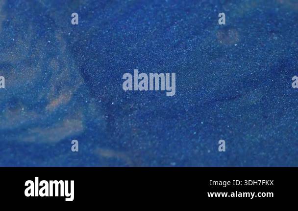 Blend water. Mix ink. Defocused blue color bright liquid flowing wet ...