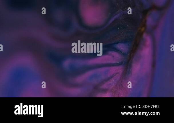 Vertical video. Glitter mix. Ink emulsion. Blur blue pink purple color ...