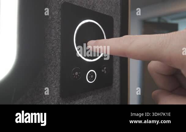 User interacts with buttons on the left side of a smart lighting ...