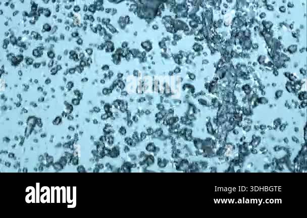 Heavy rain of water droplets falling and splashing vertically in front ...
