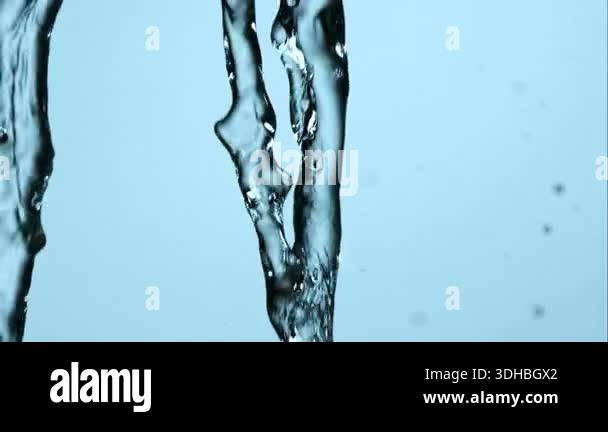 Several streams of clear water pouring and merging together with heavy ...