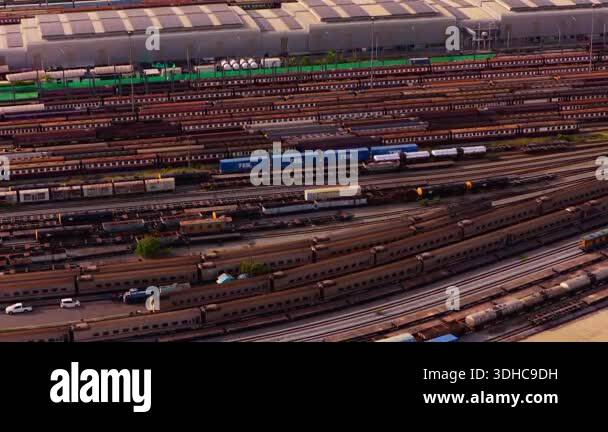 Aerial view of large train depot in Bangkok. Numerous freight and ...