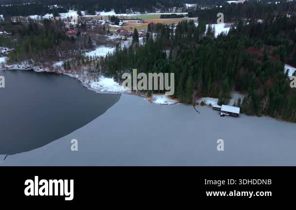 Aerial drone shot of Barmsee lake in southern Germany. Winter scenery ...