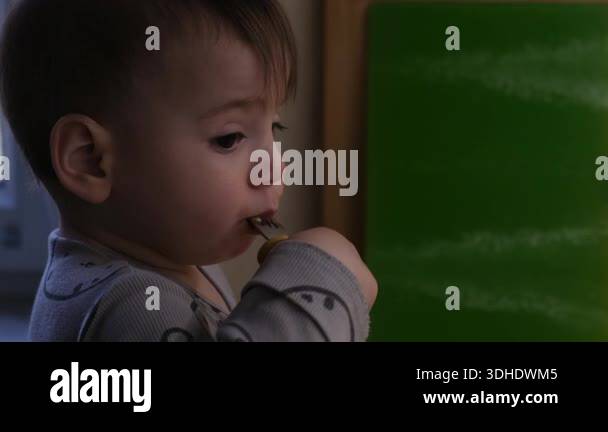 Toddler Eating with Fork in Pajamas Close Up Stock Video Footage - Alamy