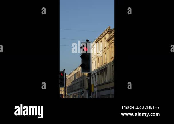 Traffic light turning red with buildings in the background, Cheltenham ...