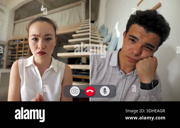 Two people are on a split screen call. The man looks bored while the ...